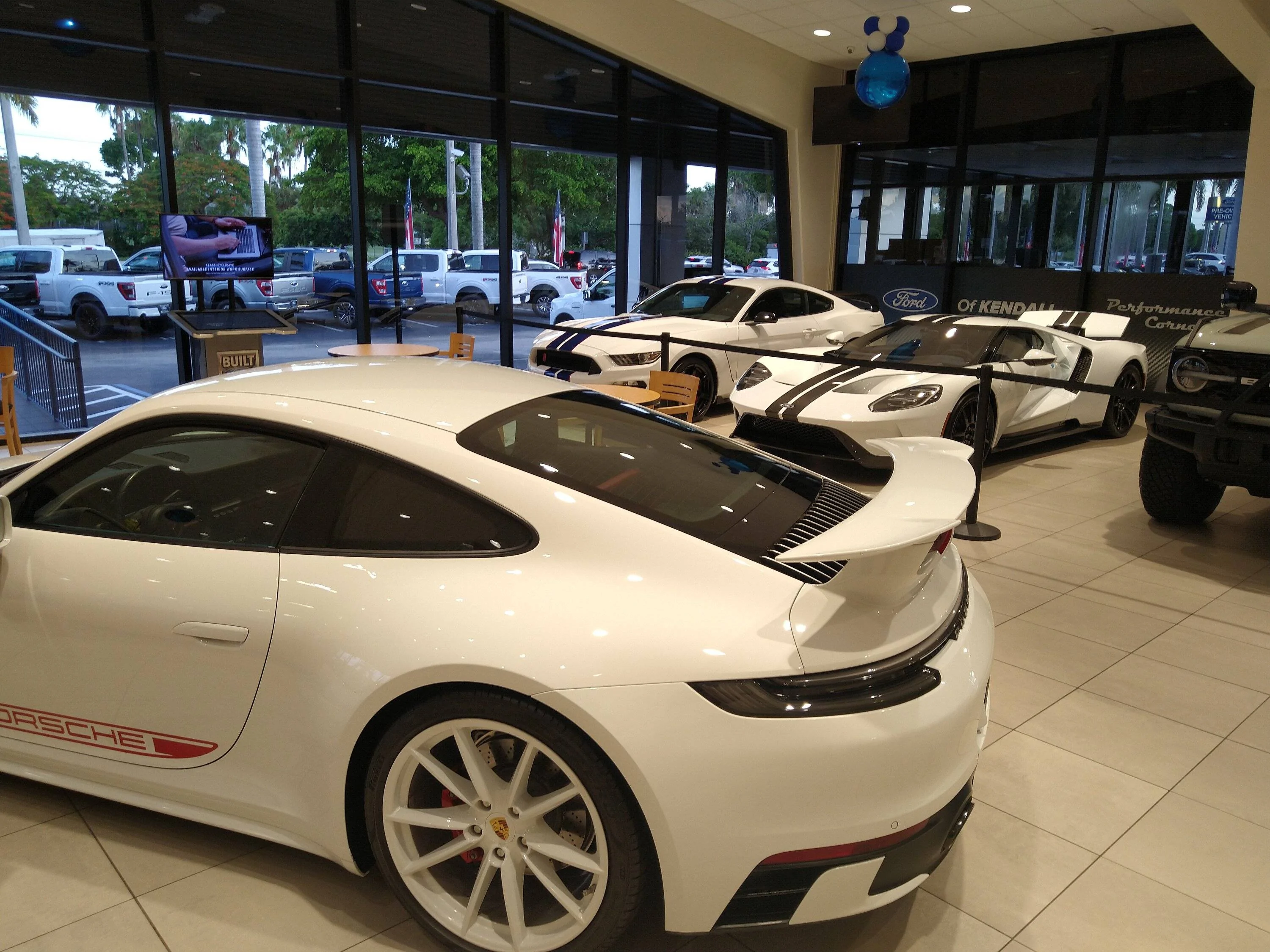 Ford Dealer with Porsche 911 on Showroom Floor | 2015+ S550 Mustang ...